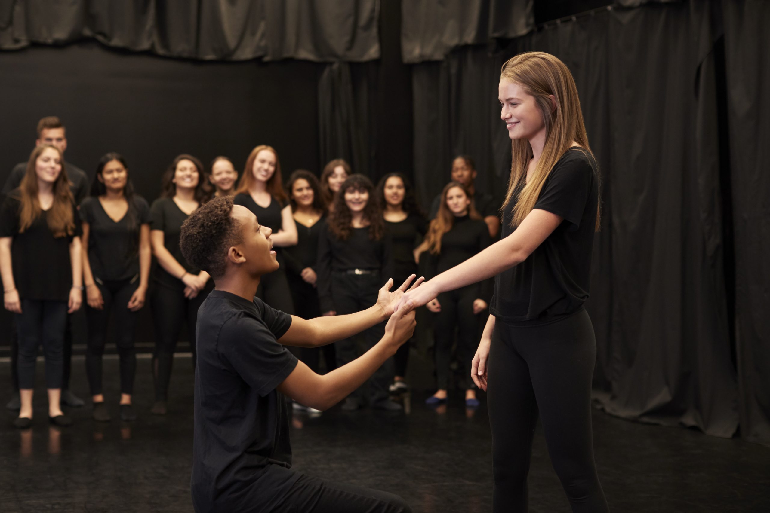 Male And Female Drama Students At Performing Arts School In Studio ...